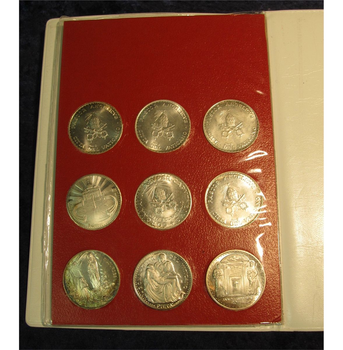 669. Souvenir of Vatican City – The Popes of the 20th Century 9 coin set in folder – either silv