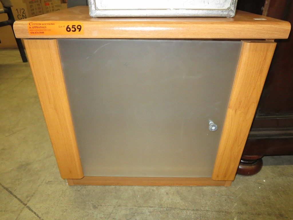 Small storage unit with glass door