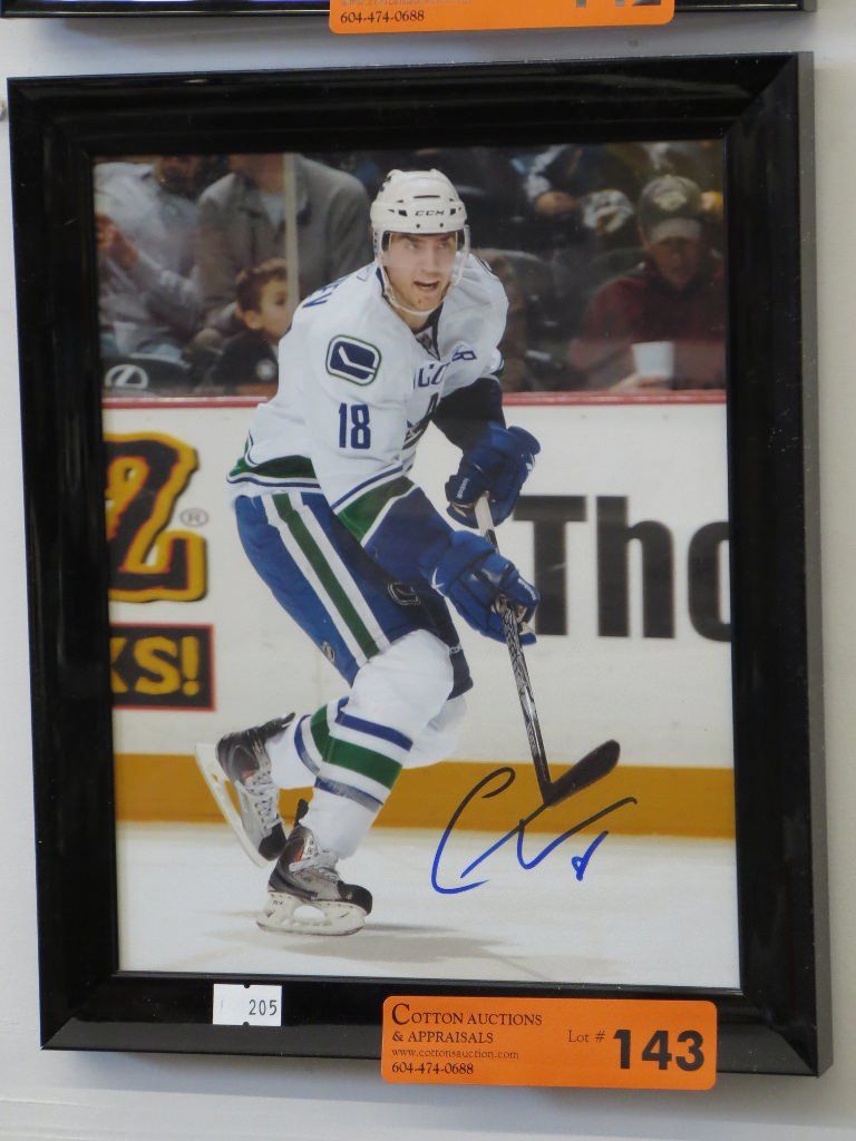 Signed hockey photo "Chris Tanev"