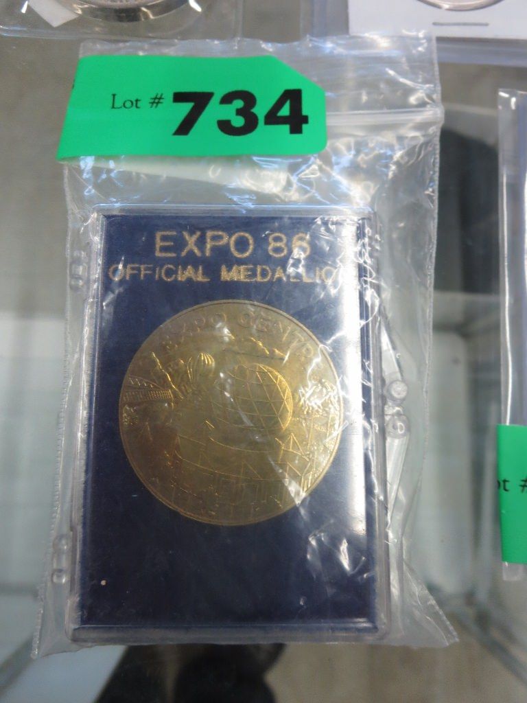 Two Expo '86 official medallions