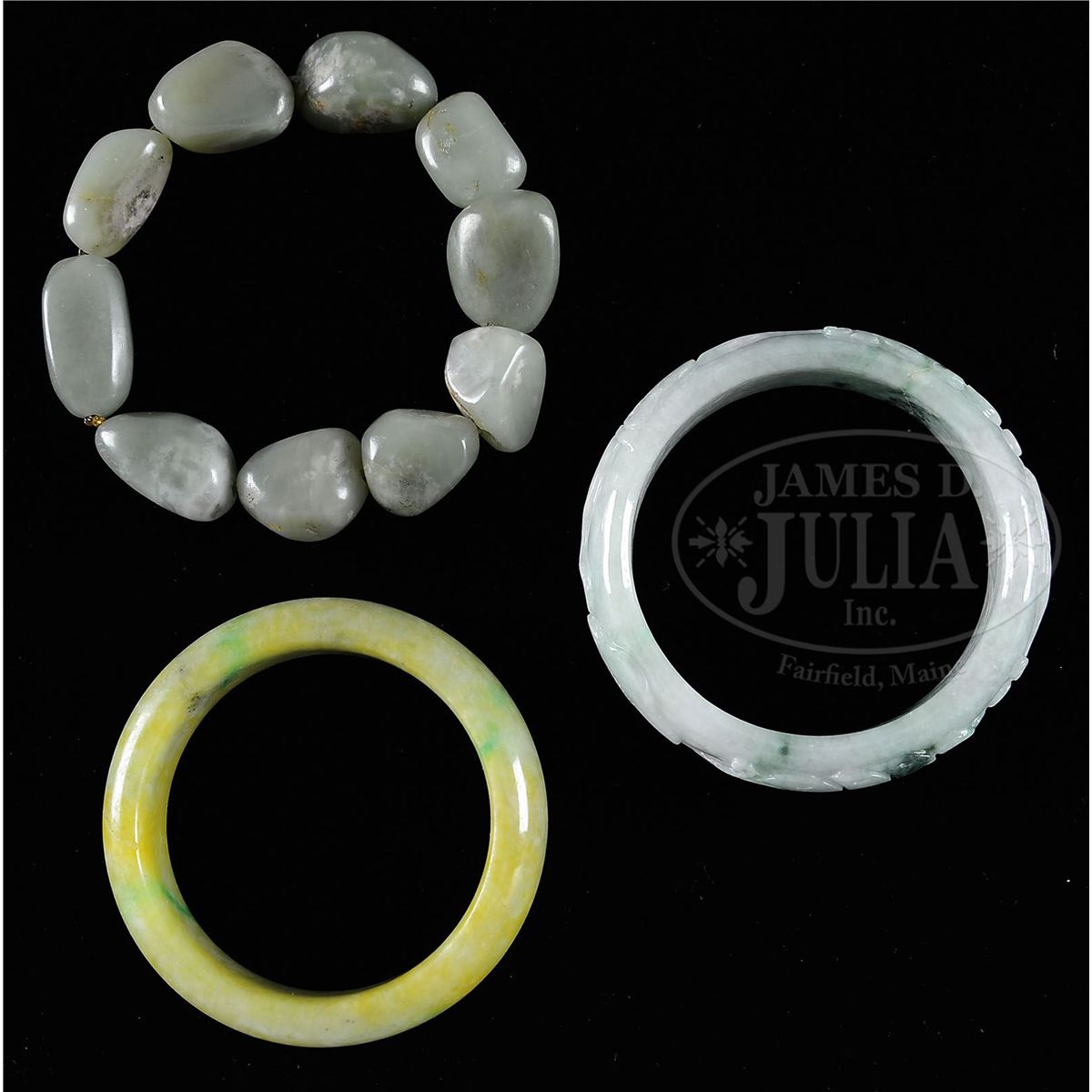 THREE JADEITE BANGLES.