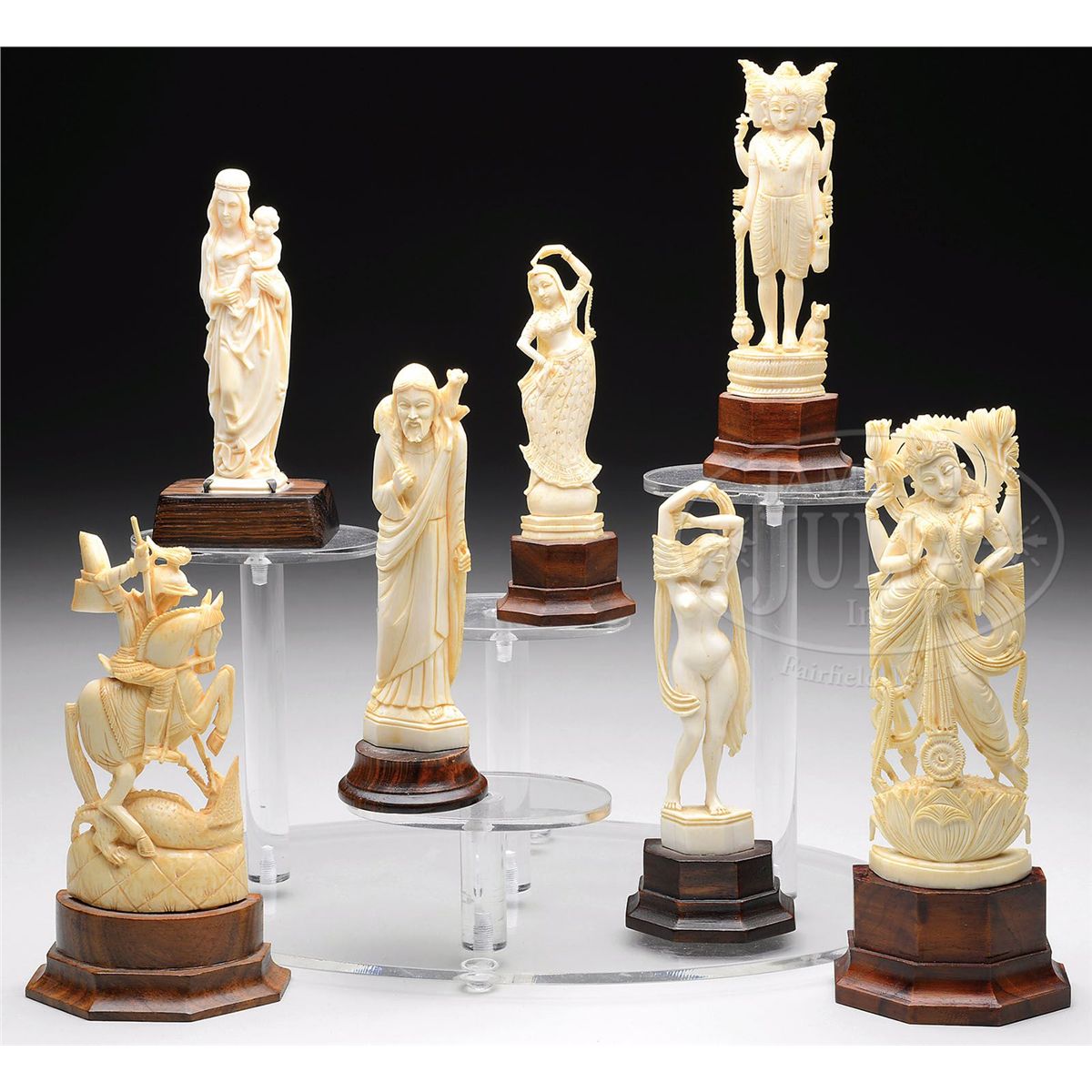 GROUP OF SEVEN IVORY CARVINGS.