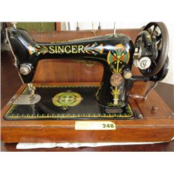 Antique portable Singer sewing machine, with cover