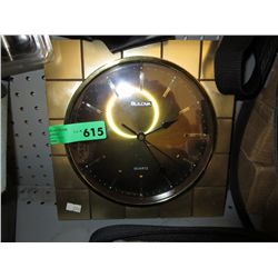 Bulova wall clock 12" x 12, works
