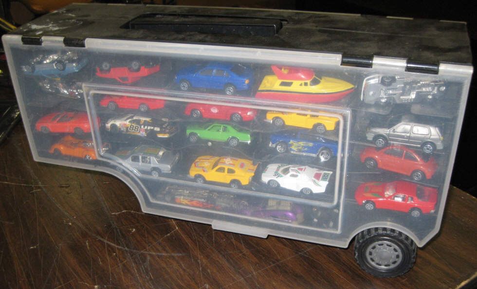 Plastic Small Car Storage Trailer Full Of Cars.