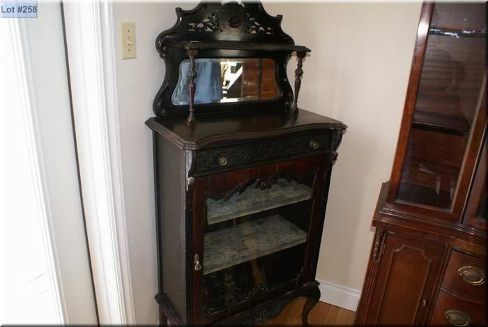 Victorian single door display with carved mirrored backboard, carved ...