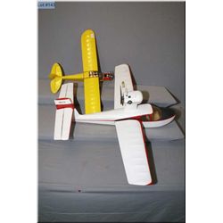 Two handmade gas powered model airplanes