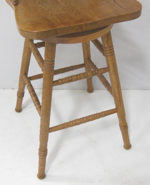4 oak pressed back swivel bar stools