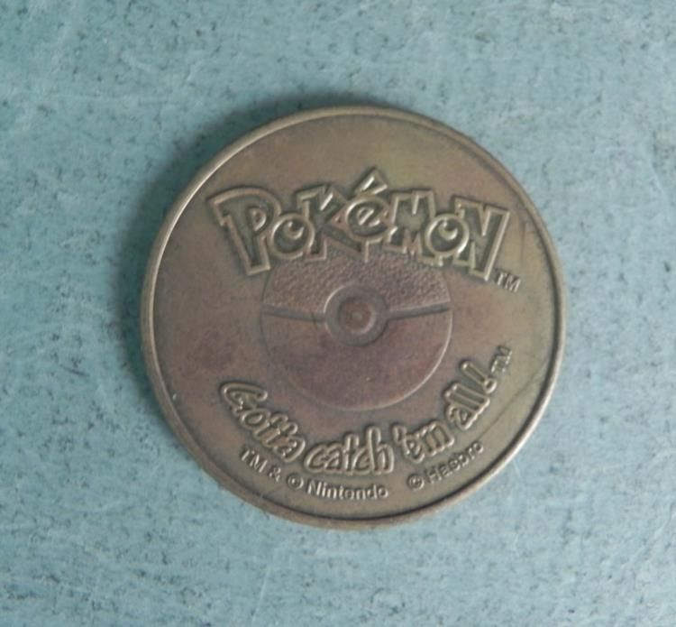 1 Lot of 57 Pokemon Coins Hasbro