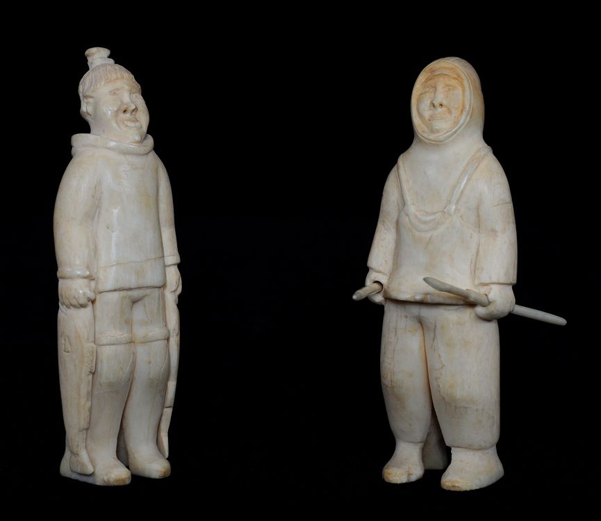 Two Marine Ivory Carvings; One of an Inuk Holding a Fish and the Other ...
