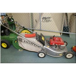 A Honda rear bag lawn mower, Model HRA 215
