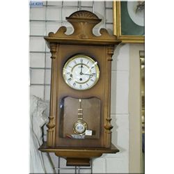 Forestville German made chiming wall clock with porcelain pendulum and face