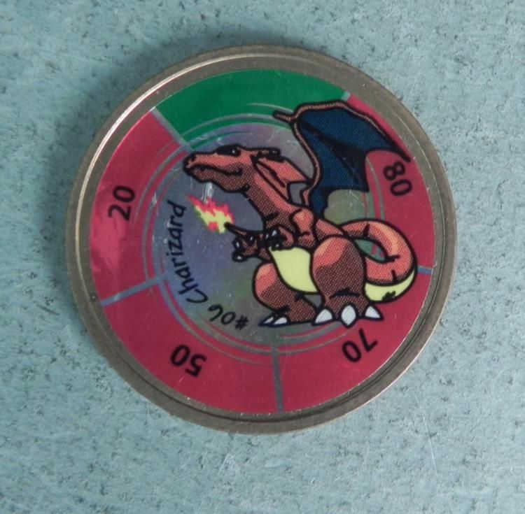 1 Lot of 57 Pokemon Coins Hasbro