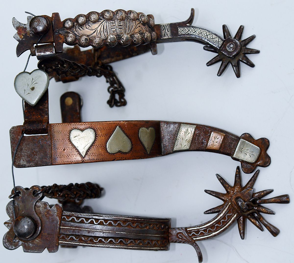 3 Buermann outstanding and extra rare single spurs