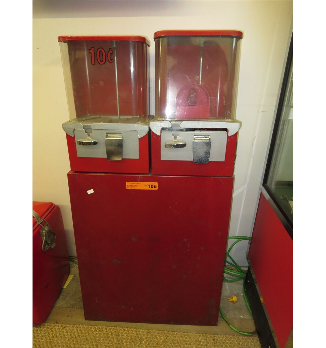 Vintage coin operated candy dispenser