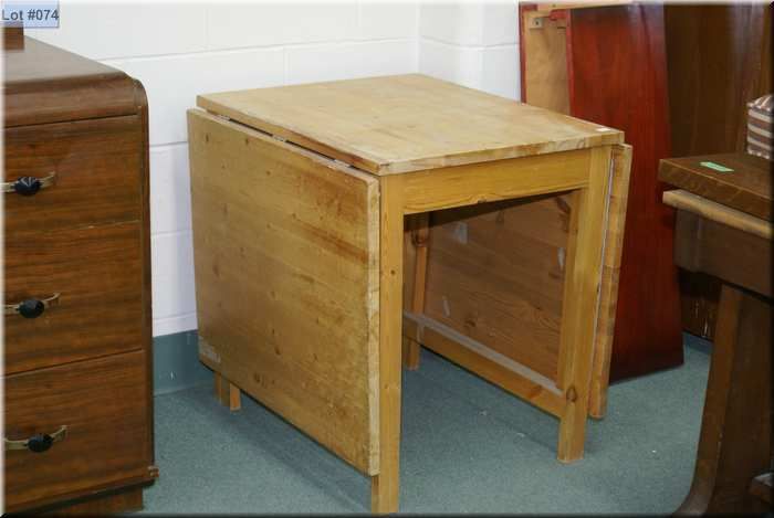 Heavy drop leaf knotty pine kitchen table