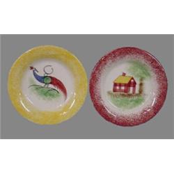 TWO SPATTER CUP PLATES BY CYBIS. Yellow border with red, green, and ...