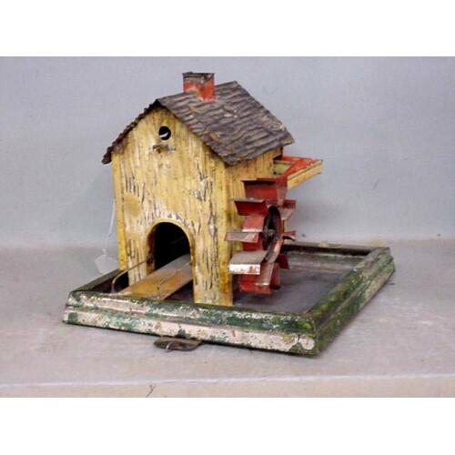 DOLL ET CIE TIN WATER MILL TOY. A handpainted water wheel pump house ...