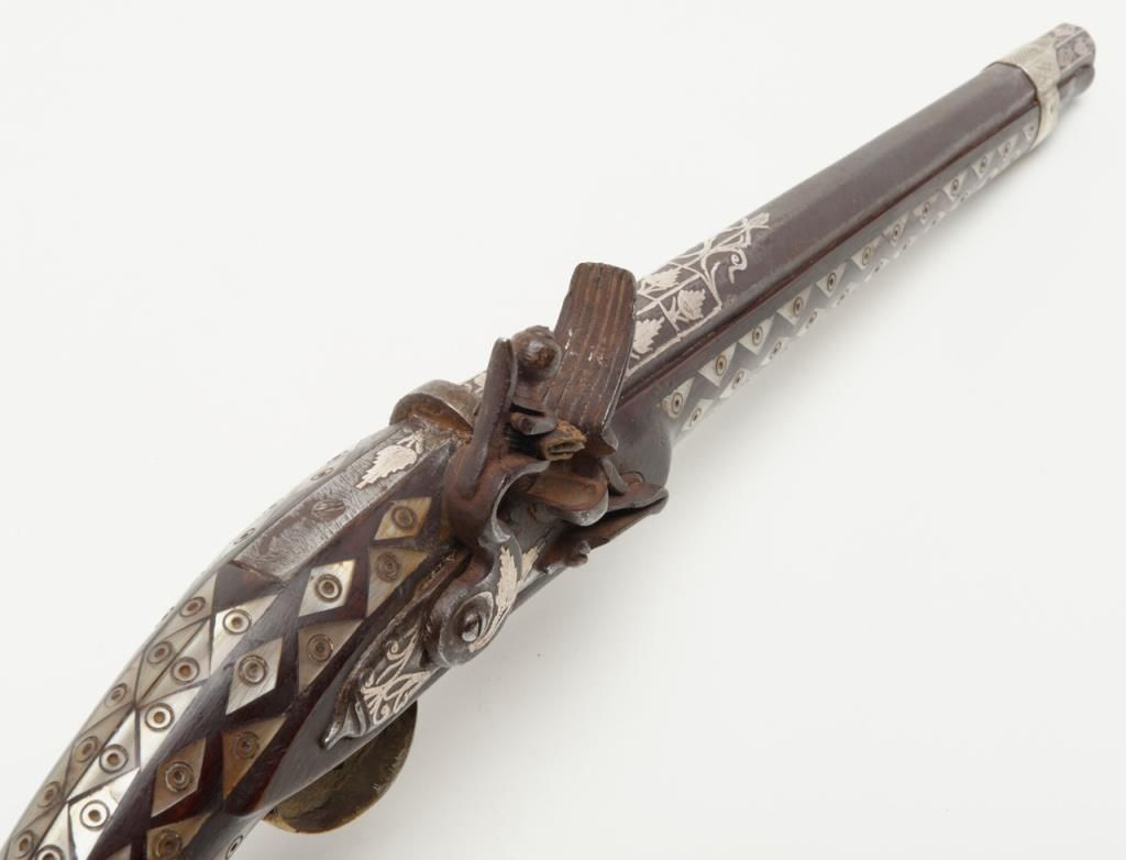 Mideast to North African flintlock pistol showing pearl inlaid stock ...