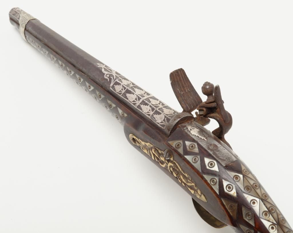 Mideast to North African flintlock pistol showing pearl inlaid stock ...