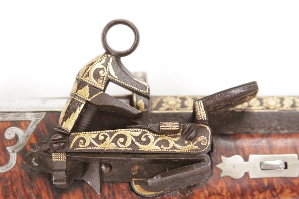 A very fine Ottoman Turkish shishana miquelet rifle. Octagonal barrel ...