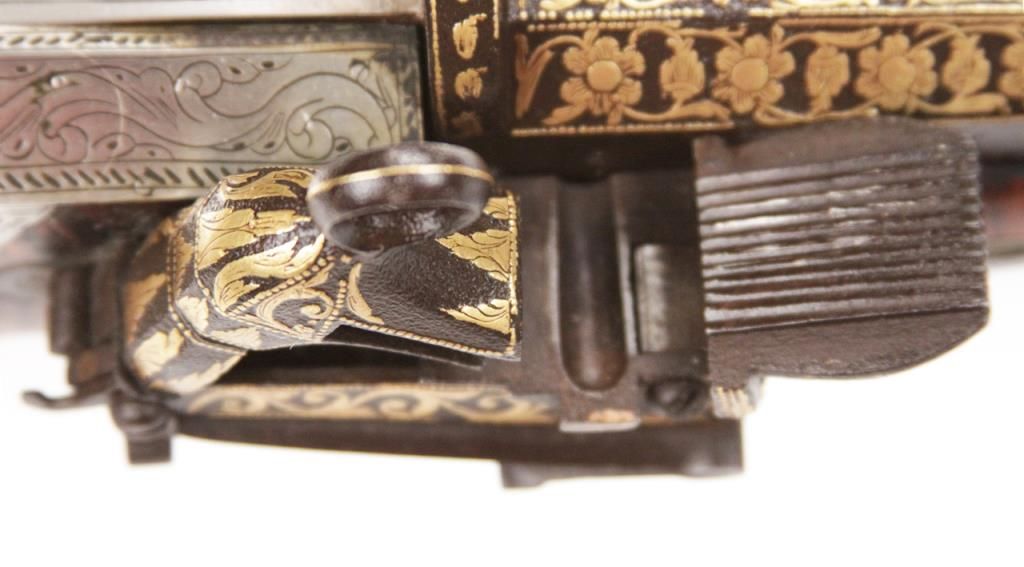 A very fine Ottoman Turkish shishana miquelet rifle. Octagonal barrel ...