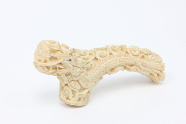 Carved bone Chinese cane top with dragons