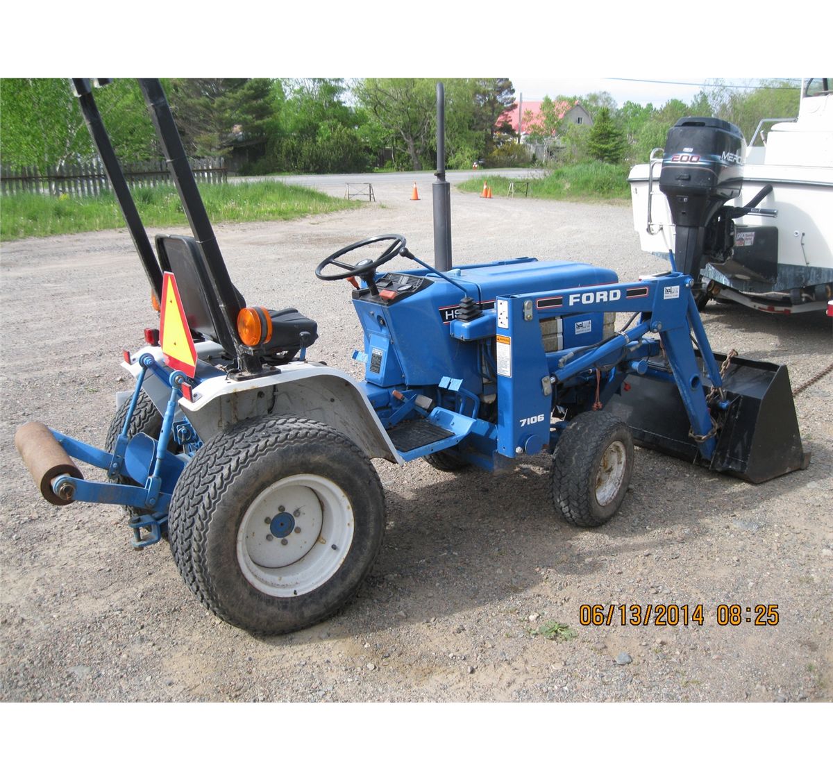1995 FORD 1220 DIESEL AWD TRACTOR W/7106 LOADER