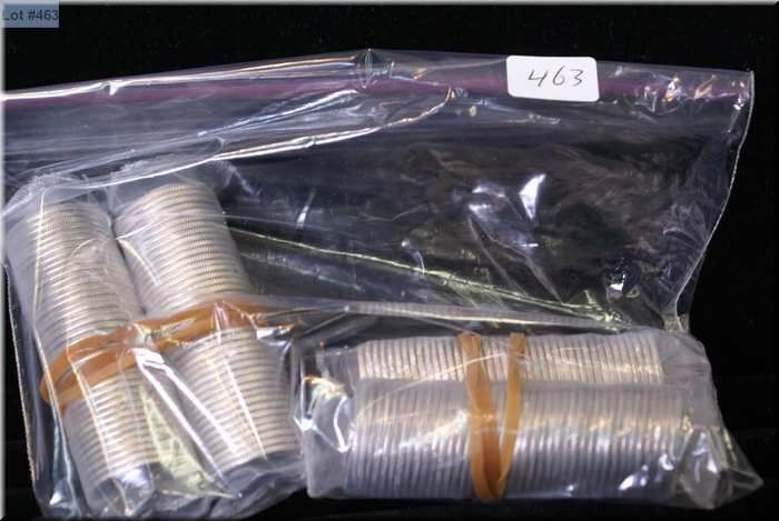 Four rolls of Canadian Olympic quarters