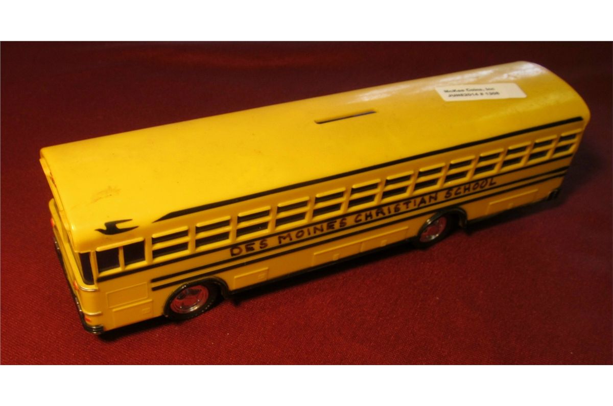 1308. Blue Bird School Bus Bank with hand written lettering "Des Moines ...