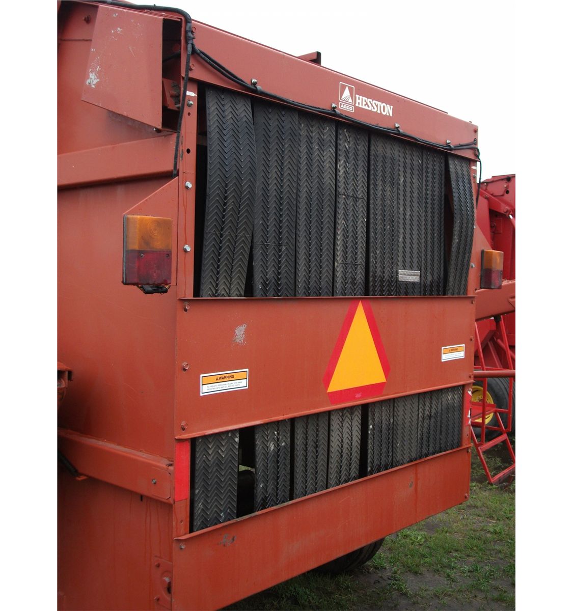 HESSTON 565A ROUND BALER WITH GATHERING WHEELS