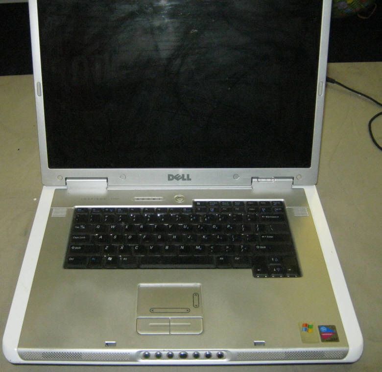 Silver Dell Laptop Computer. Police Seized.