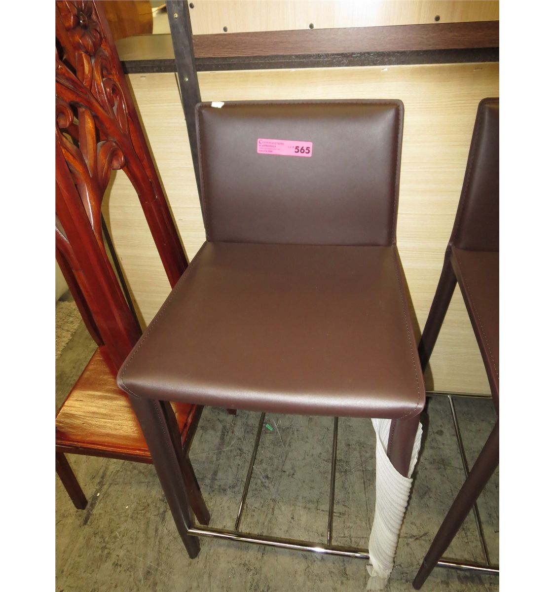 Metal bar stool with leather upholstered seat & back