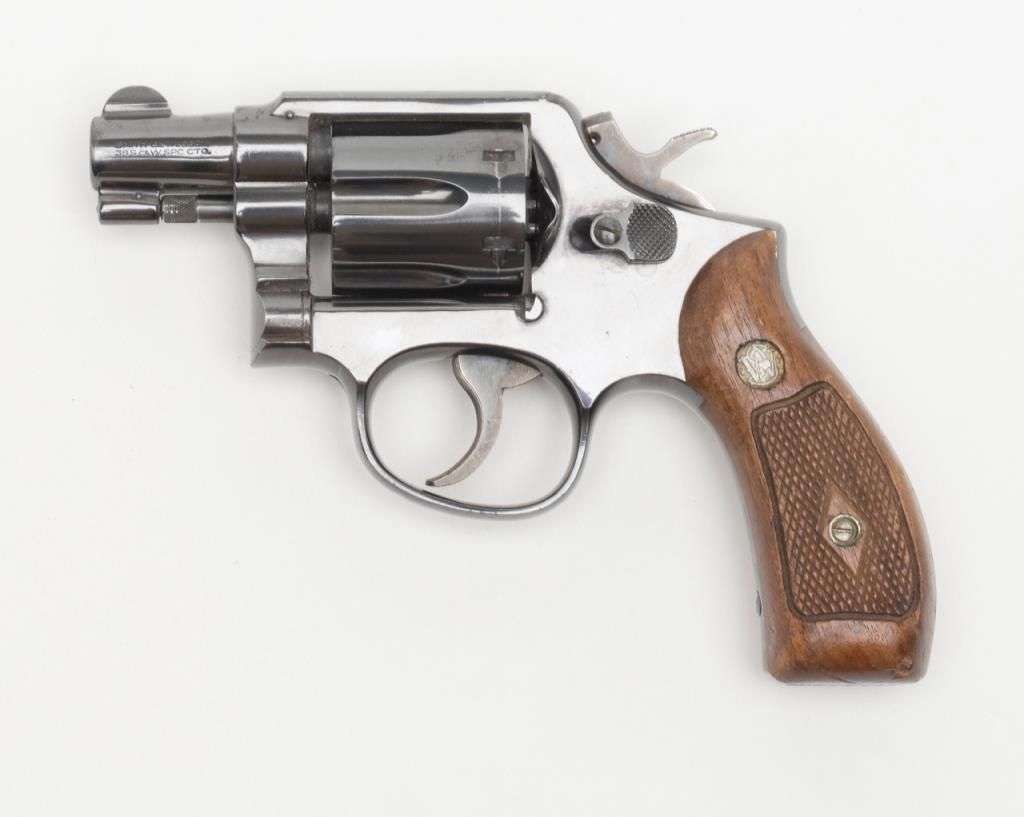 Smith & Wesson pre-Model 10 DA revolver, .38 Special cal., 2” barrel, blue finish, checkered wood