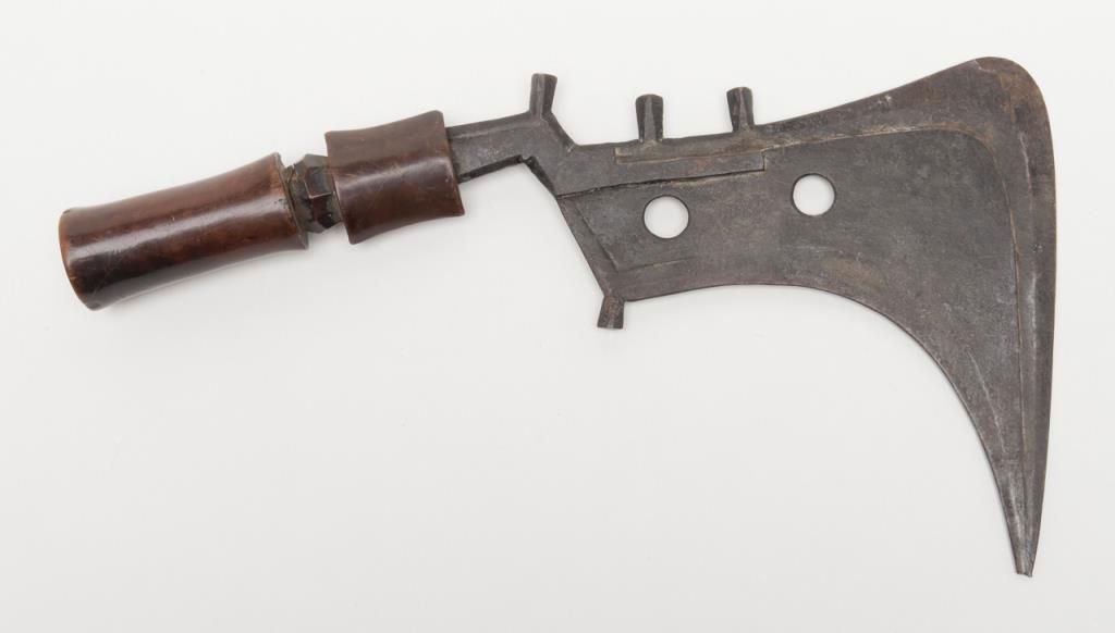 Authentic African battle axe circa early 20th century. Est.: $150-$300.