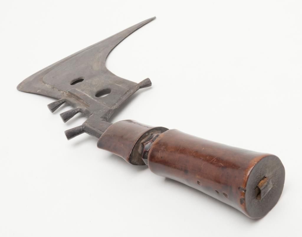 Authentic African battle axe circa early 20th century. Est.: $150-$300.