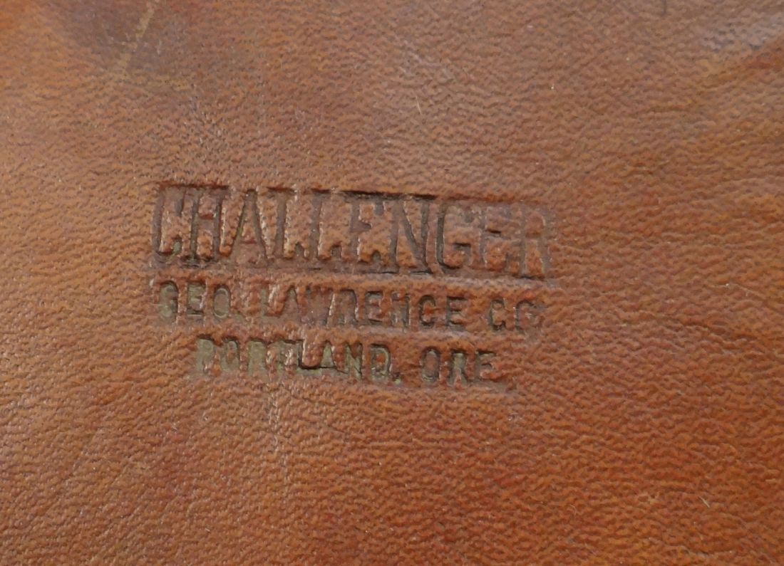 George Lawrence saddle bags, floral pattern on bottom of bags, marked ...