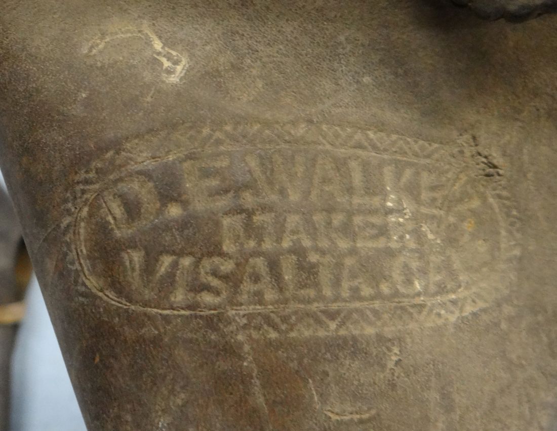 2 pair tapaderos marked DE Walker, Visalia, CA