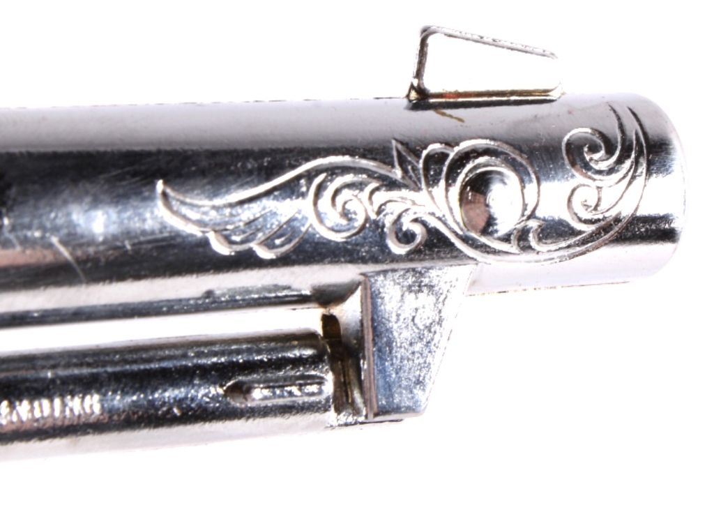 Hubley Colt .45 Cap Gun This lot features a Hubley