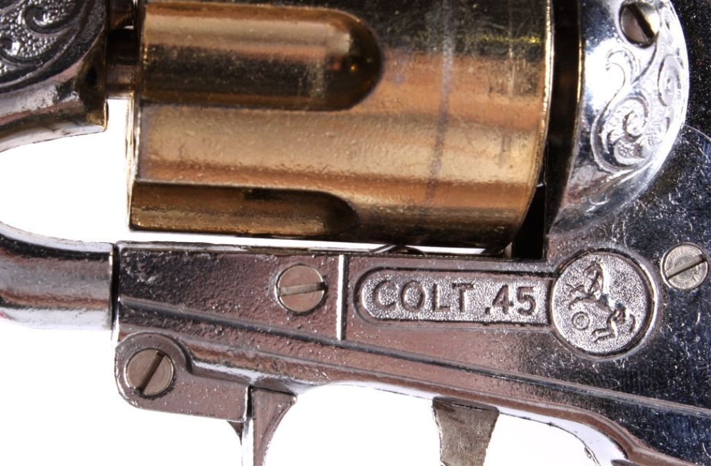 Hubley Colt .45 Cap Gun This lot features a Hubley
