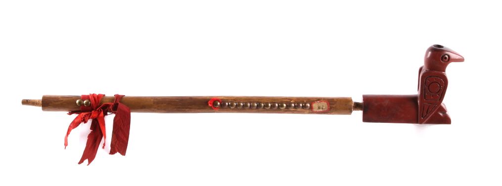Lakota Sioux Raven Pipe & Stem The lot shows a bea