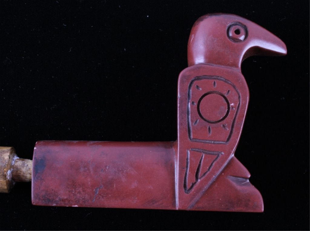 Lakota Sioux Raven Pipe & Stem The lot shows a bea