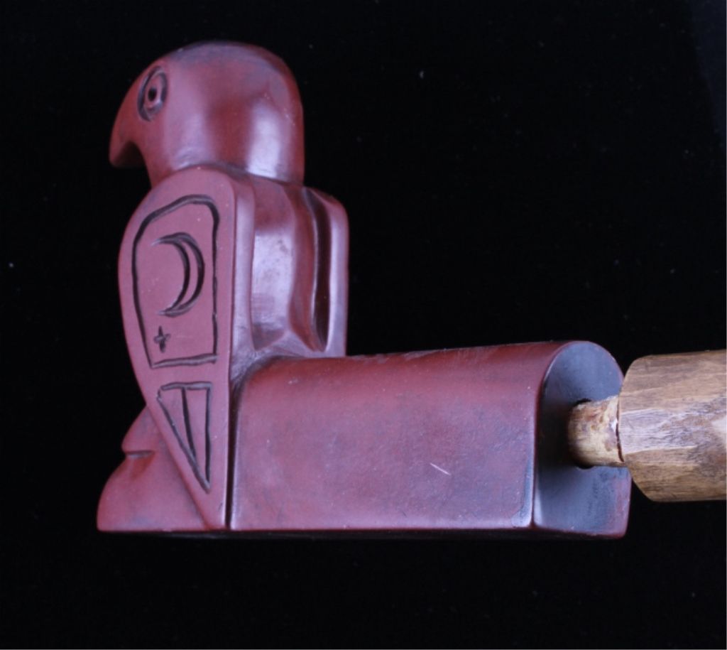 Lakota Sioux Raven Pipe & Stem The lot shows a bea