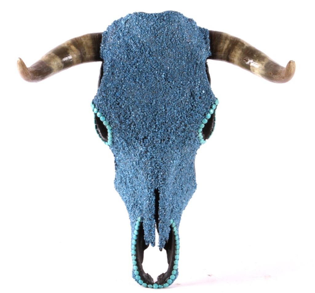 Turquoise Covered Steer Cow Skull The lot shows a