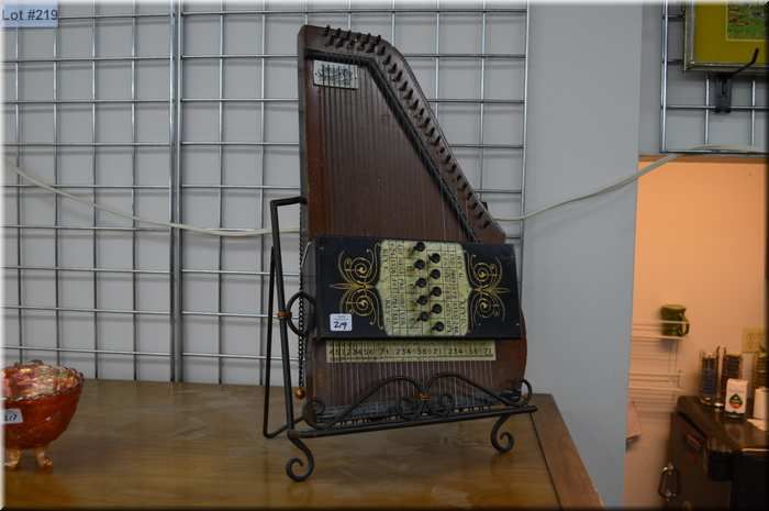 Vintage autoharp and wrought iron display stand