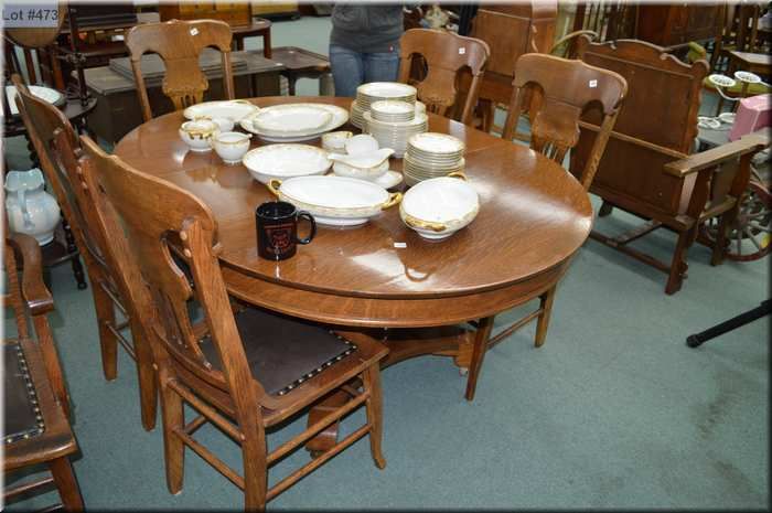 Antique Canadiana center pedestal dining table with three skirted ...