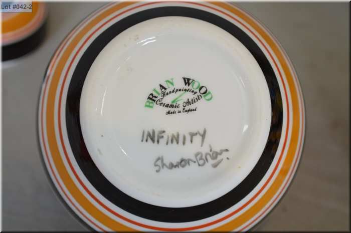 Selection of Brian Wood pottery including hand painted vase, shakers ...