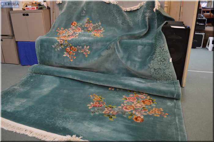 Large quality wool emerald green and floral area rug