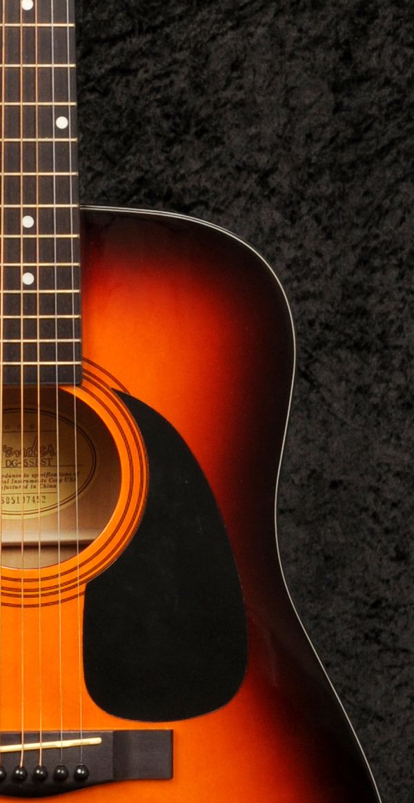 a Fender DG-5 acoustic guitar, with sunburst finish, signed on bottom ...