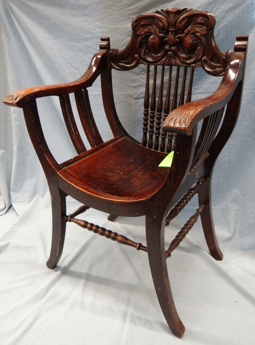 Bustle chair, 1/4 sawn oak, ornately carved back